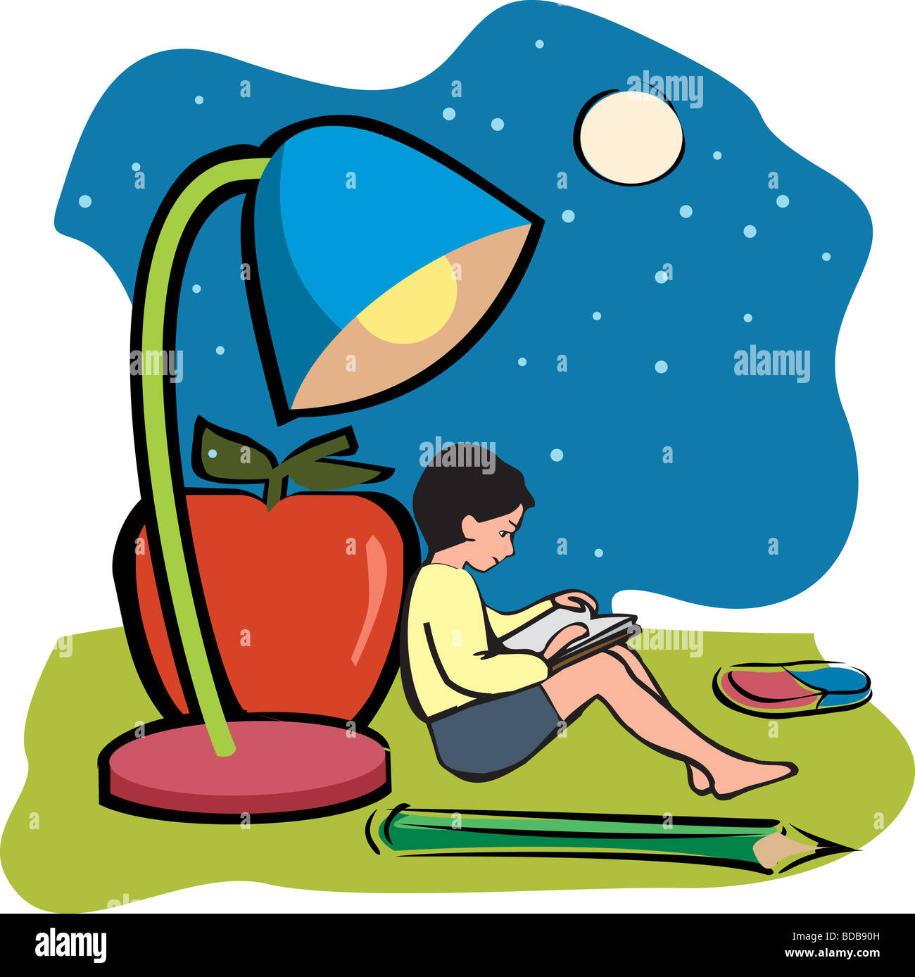 Boy reading a book Stock Photo - Alamy