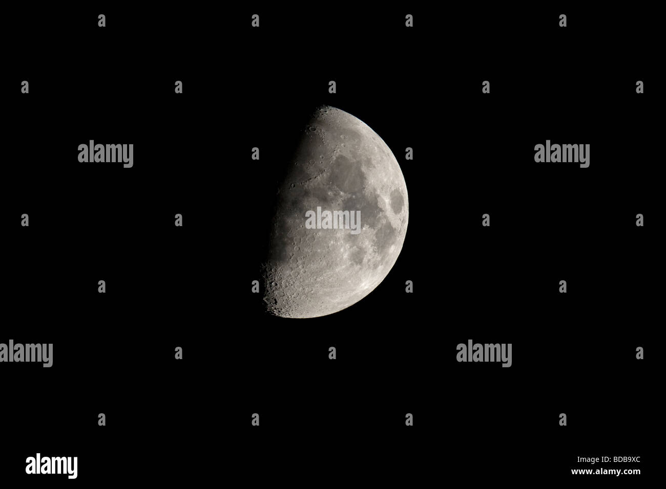 moon in half phase Stock Photo - Alamy