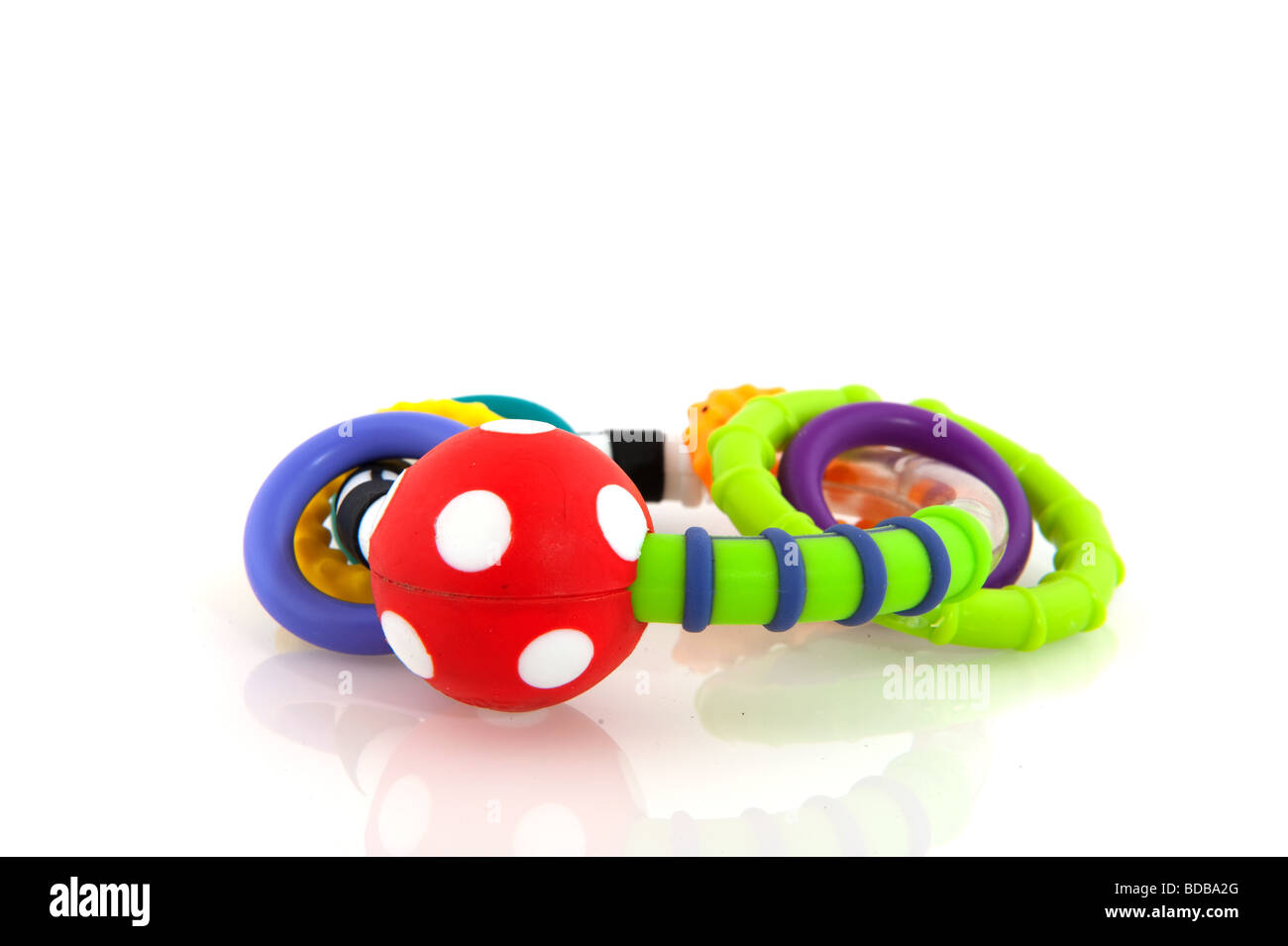 Colorful modern speckles baby rattle isolated over white Stock Photo ...