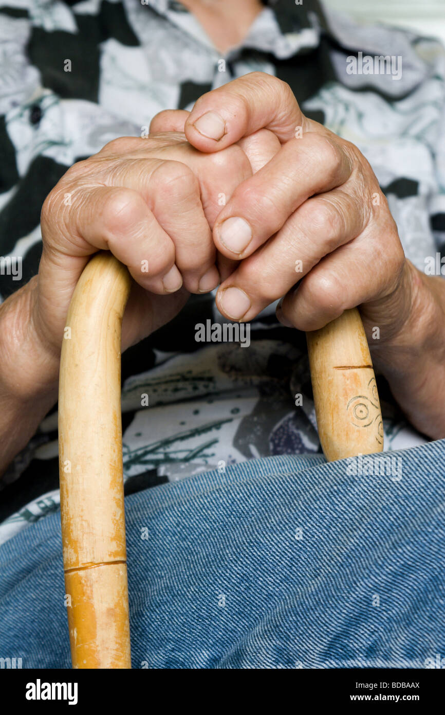 hands of old woman with stick Stock Photo - Alamy