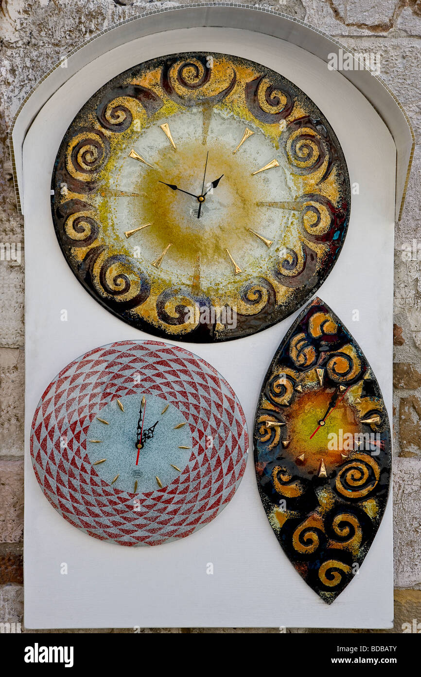 Three decorative wall clocks Stock Photo - Alamy