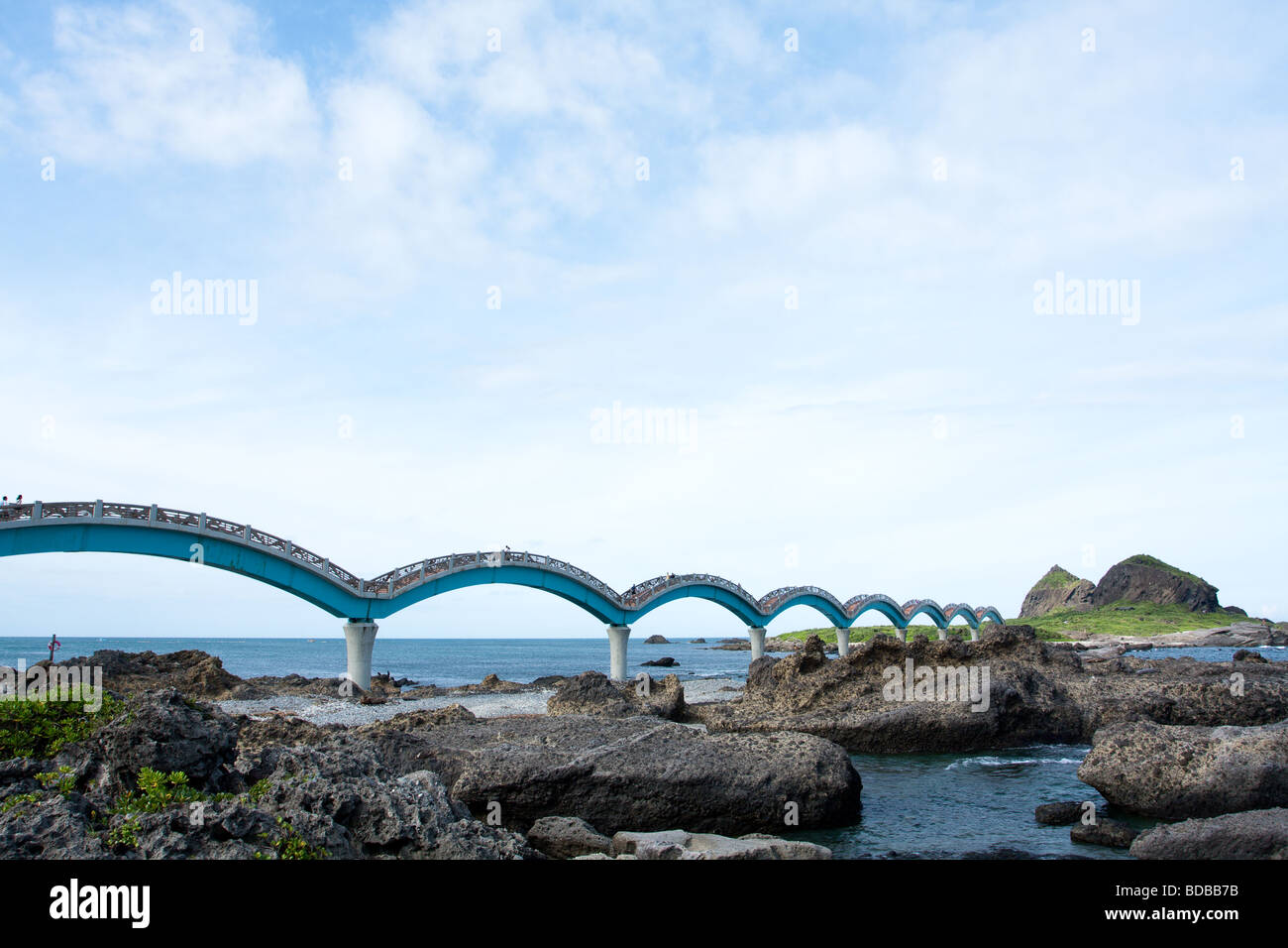The iconic eight-arch footbridge and a small island off the coast at ...