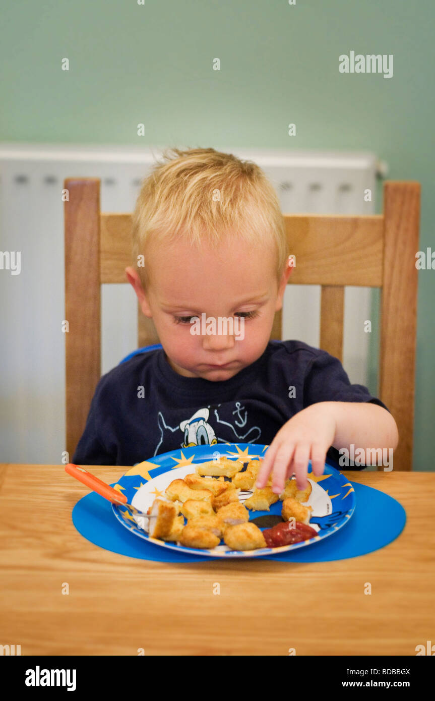 Chicken Nuggets Child High Resolution Stock Photography and Images - Alamy