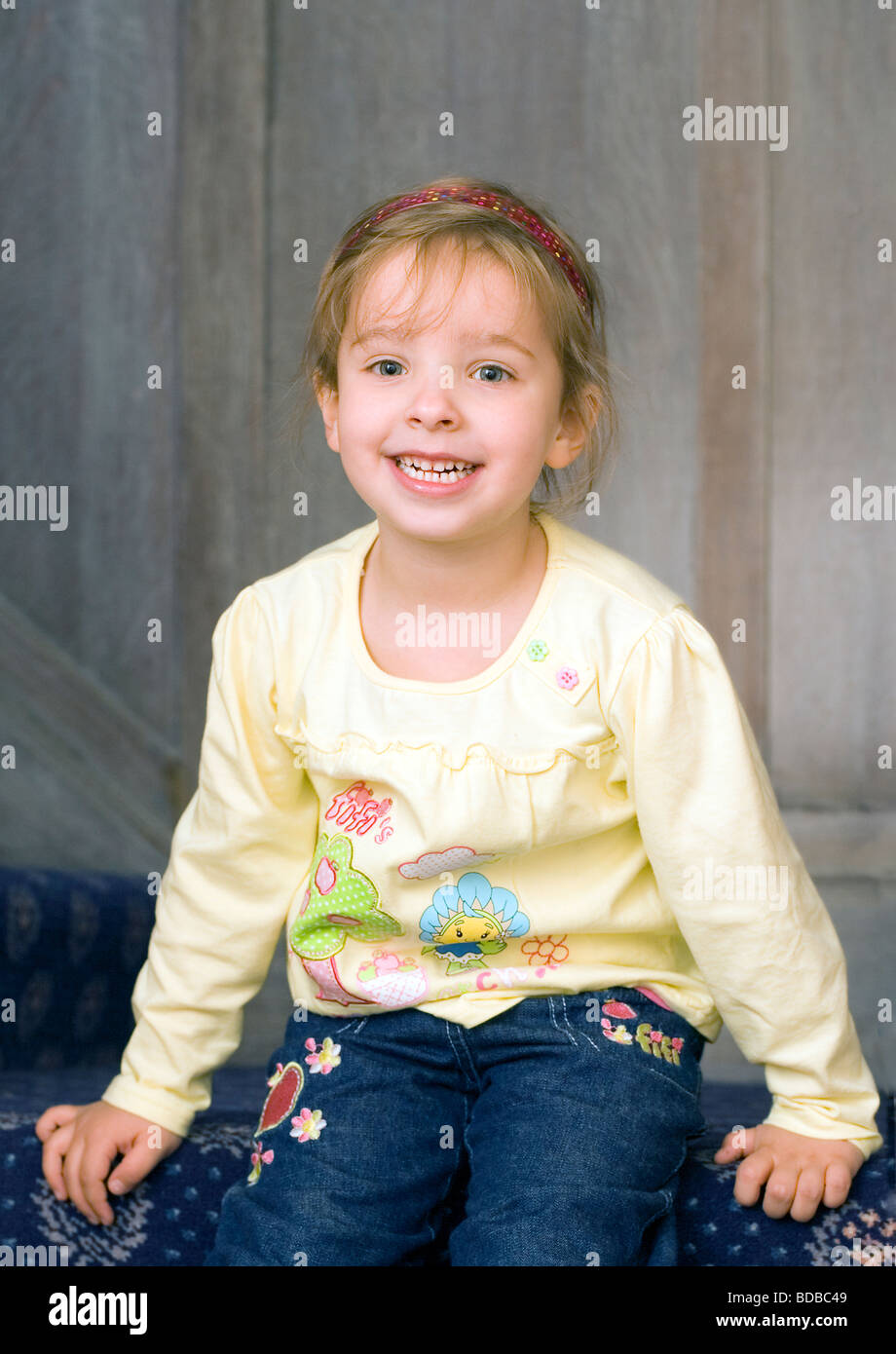 Pretty four year old girl on stairs - London, England, UK, Europe Stock ...