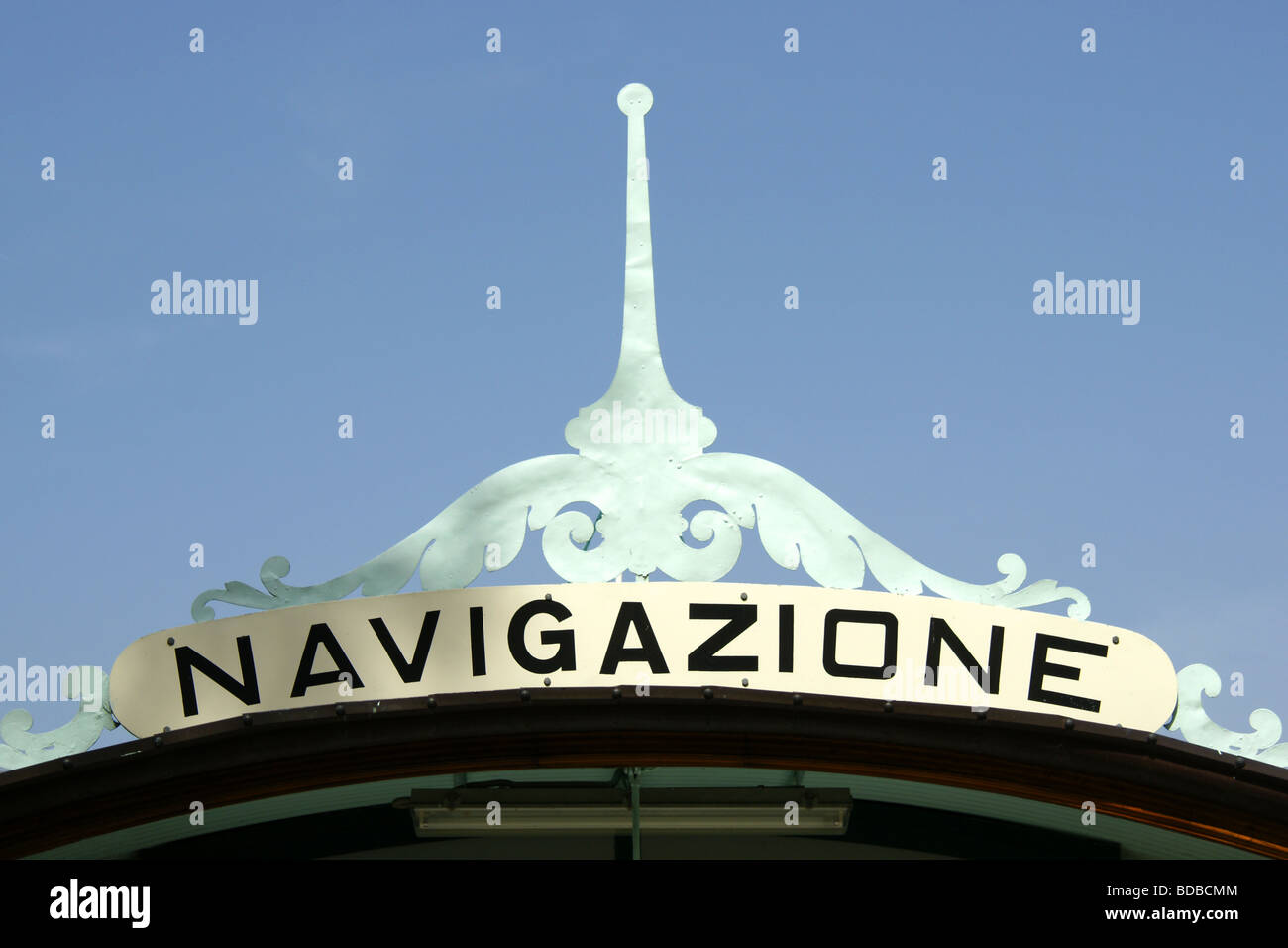 Navigazione, sign for Lake Como ferry landing at the town of Bellano ...