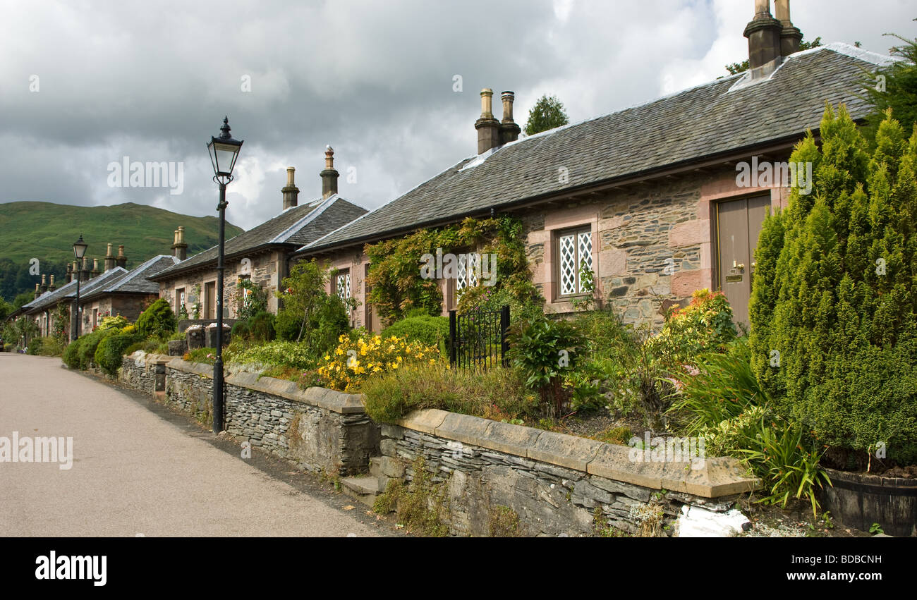 Stone cottages built to house mill and slate workers in the Scottish ...
