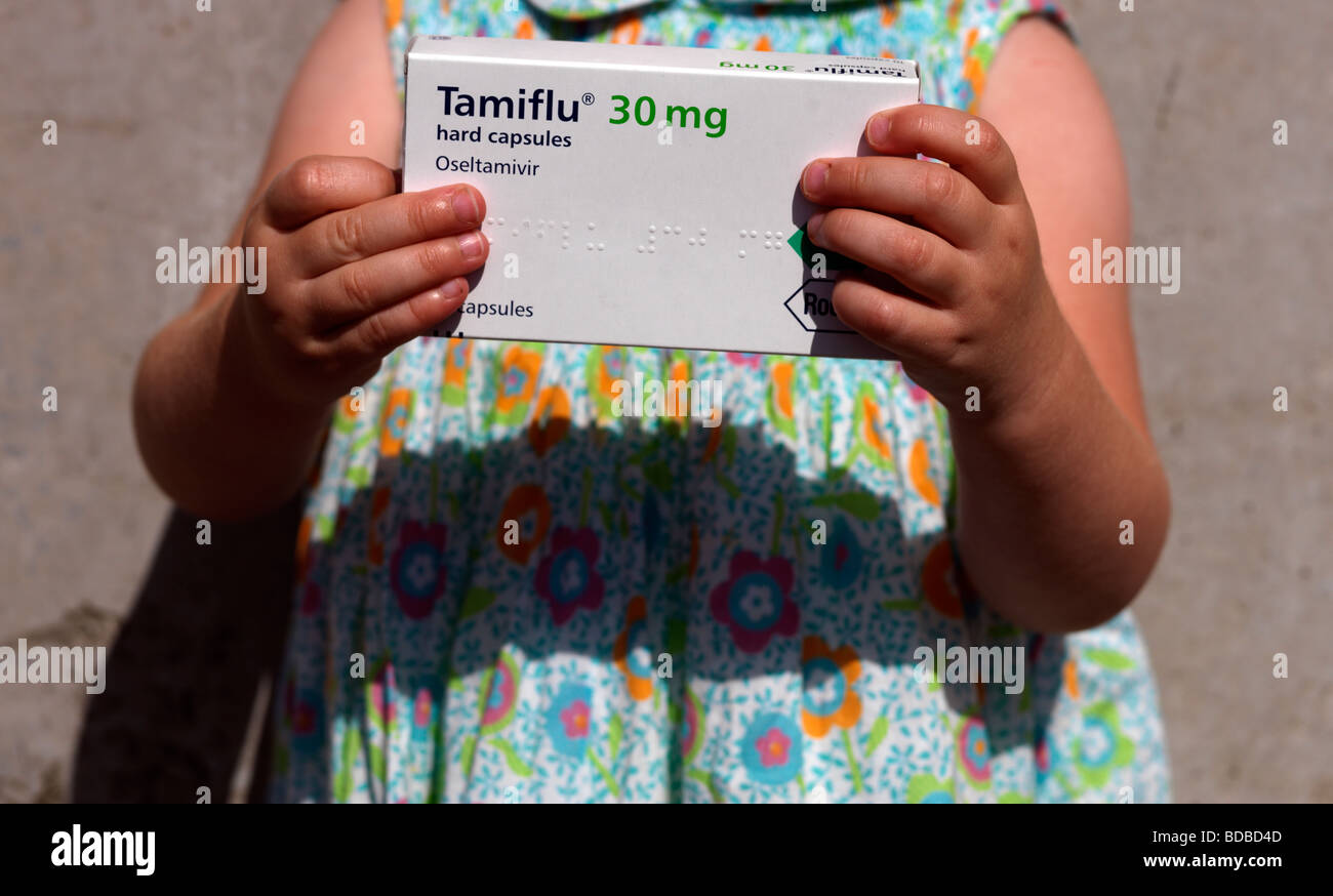 toddler holding box of tamiflu tablets Stock Photo - Alamy
