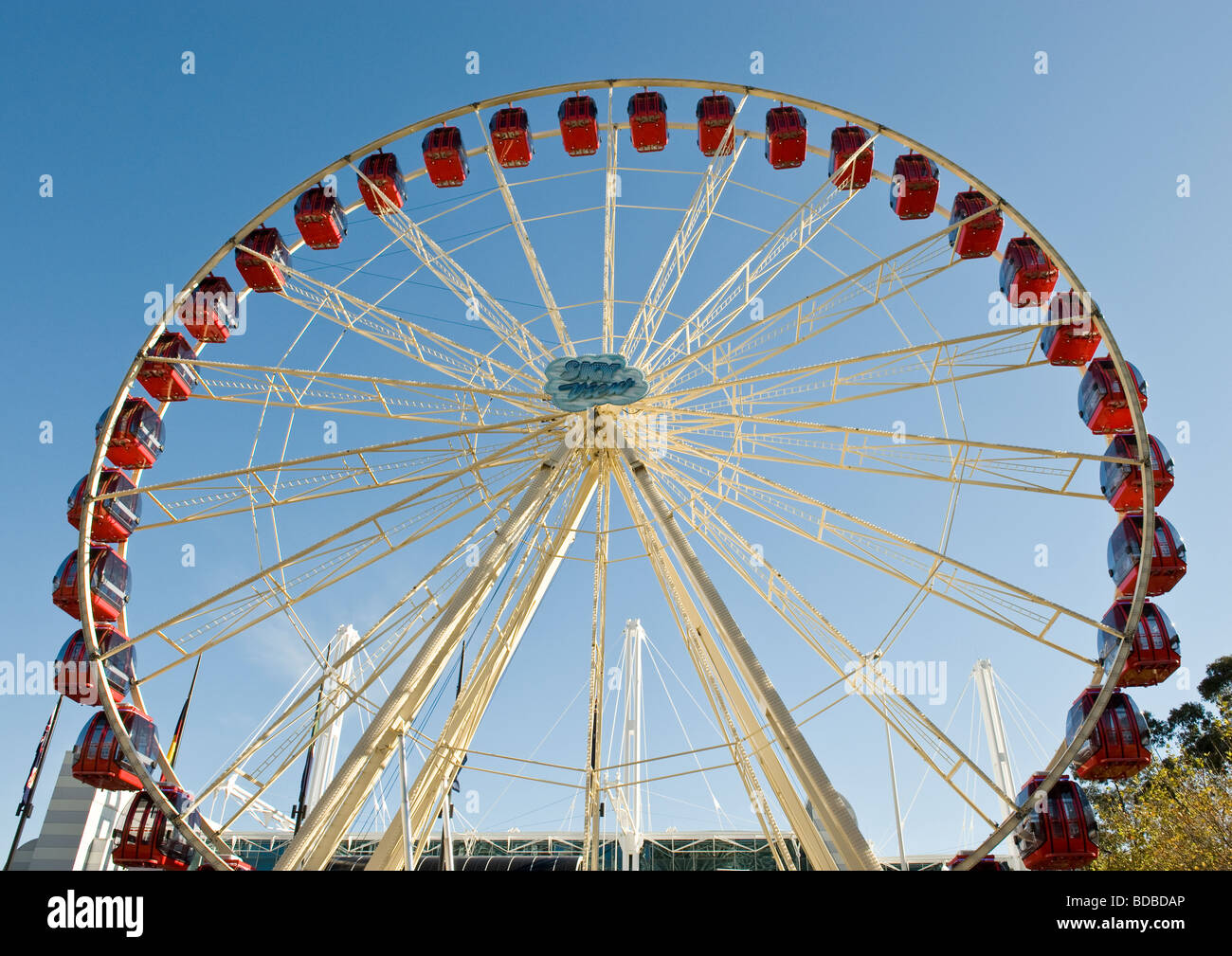 Immense Ferris Wheel with gondolas of large windows at Darling Harbour ...