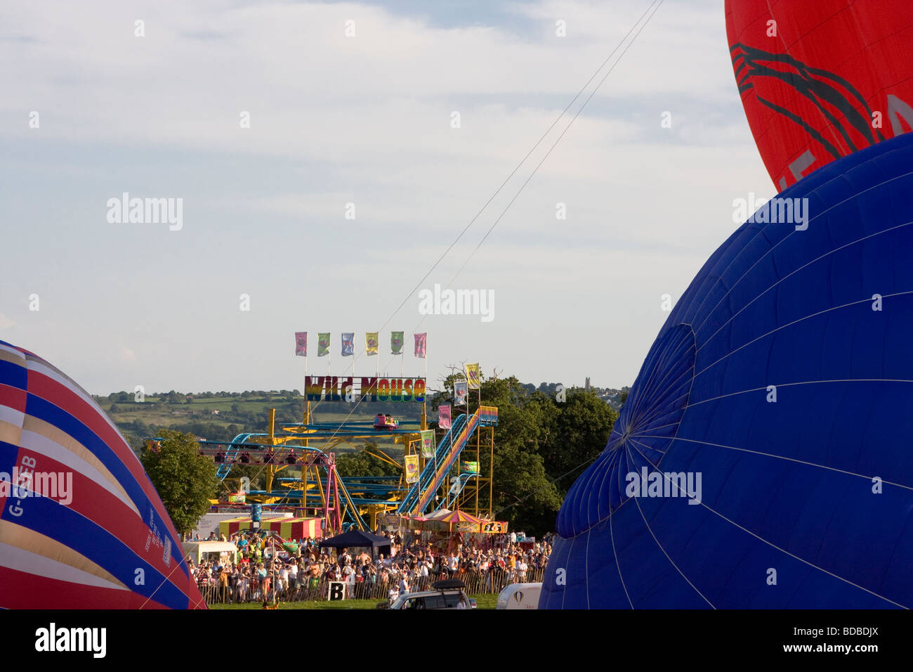 Bristol Balloon fiesta with balloons and fairground ride Stock Photo ...