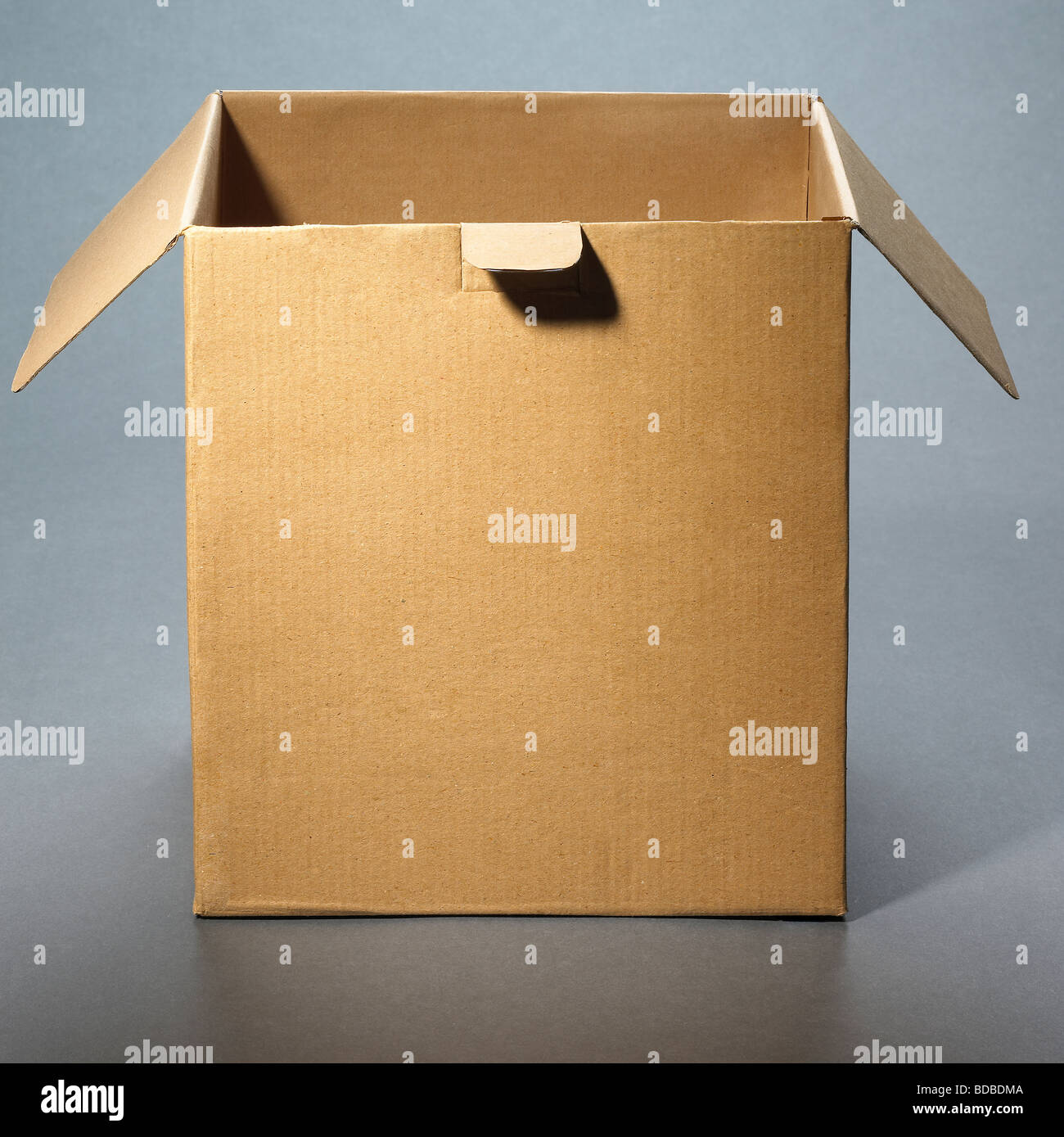 Open Cardboard Box standing front on Stock Photo - Alamy