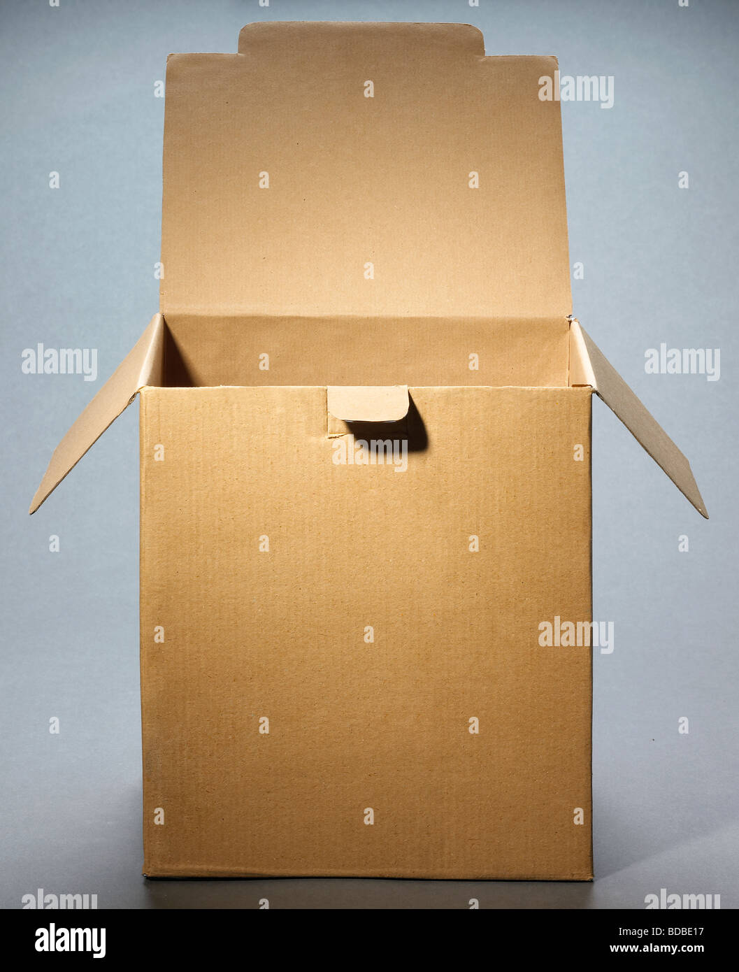 Open Cardboard Box standing front on Stock Photo - Alamy
