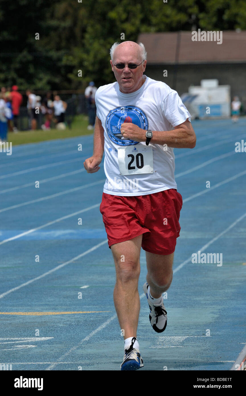 Senior male runner at the Track and Field competition during the ...