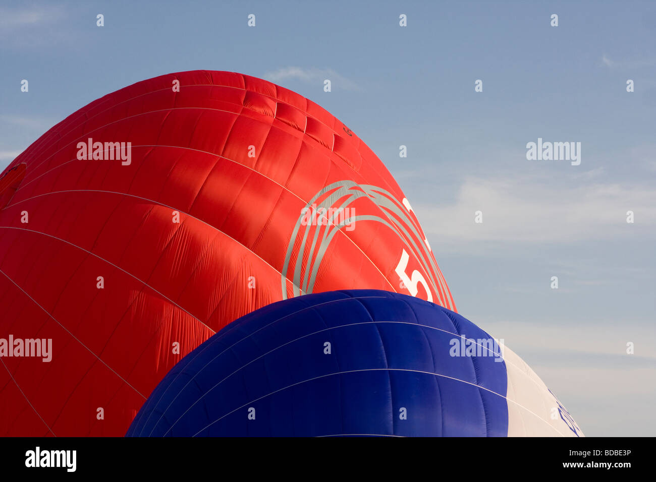 Red and blue hot air balloons Stock Photo - Alamy