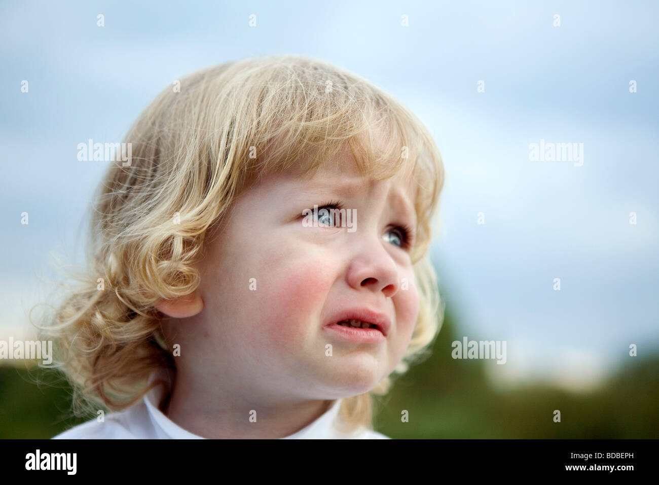 portrait of crying young boy Stock Photo - Alamy
