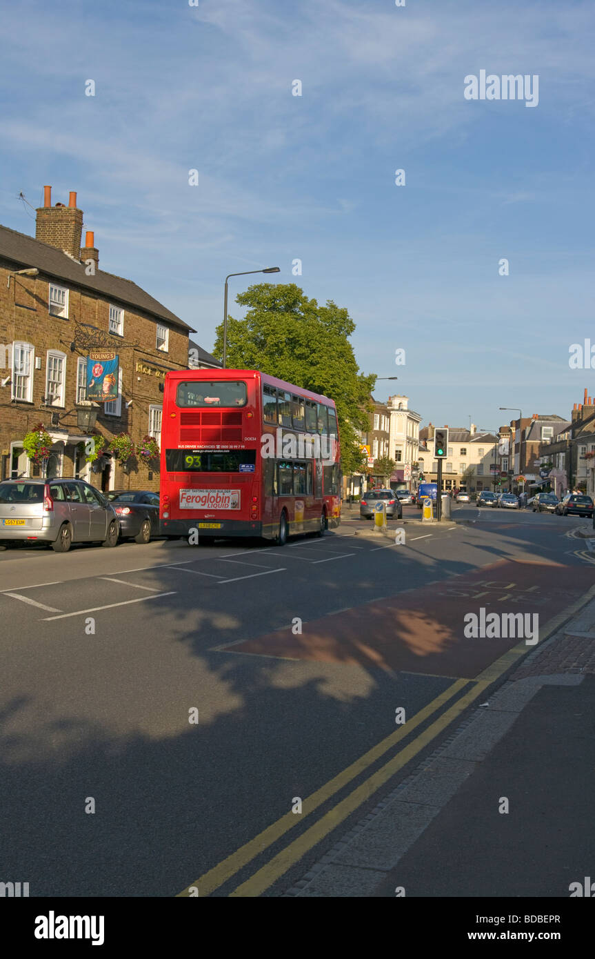 A View Down Wimbledon Village High Street With a Red London Bus Stock ...