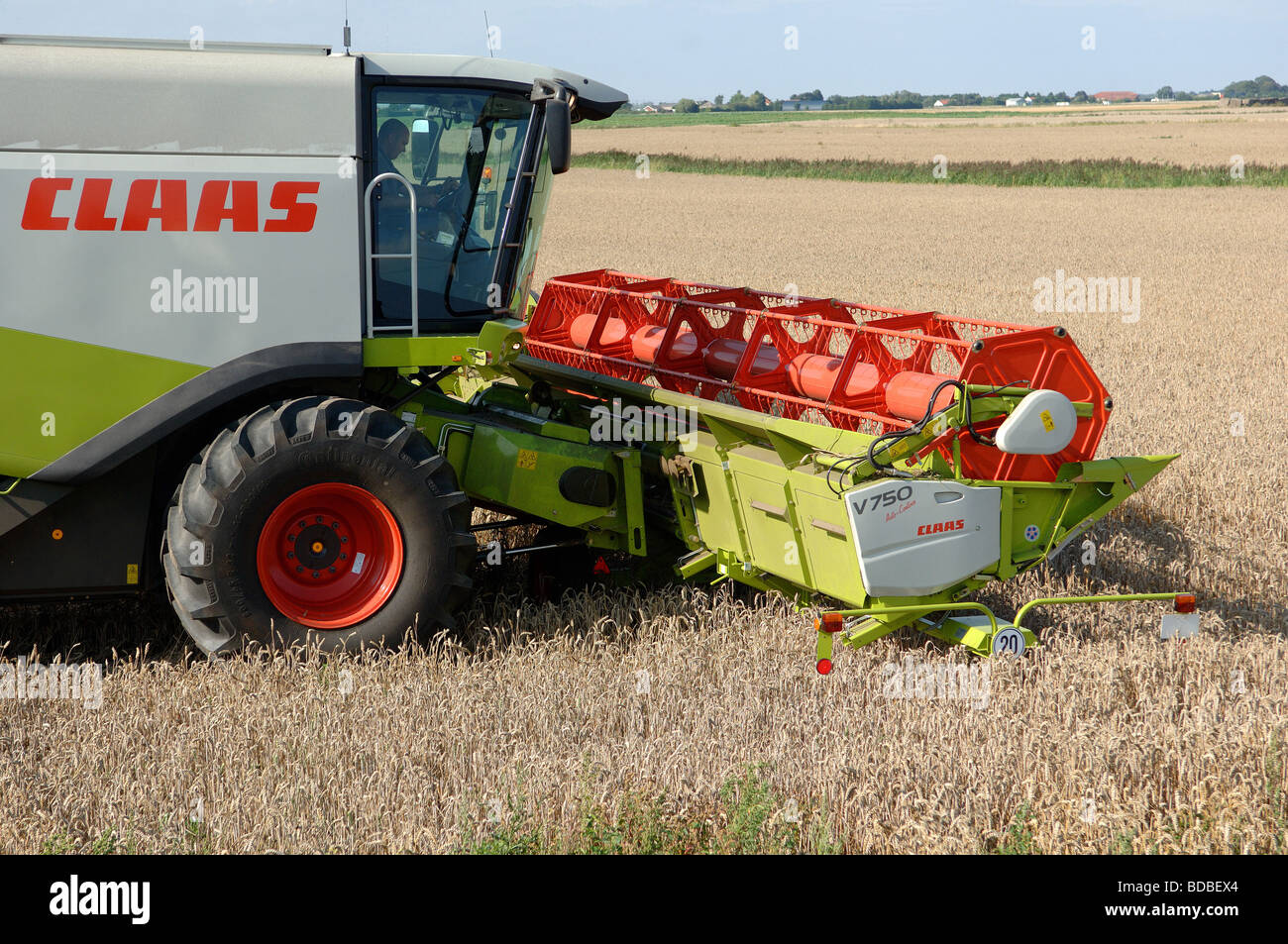 Claas combine harvester fitting cutter hi-res stock photography and ...