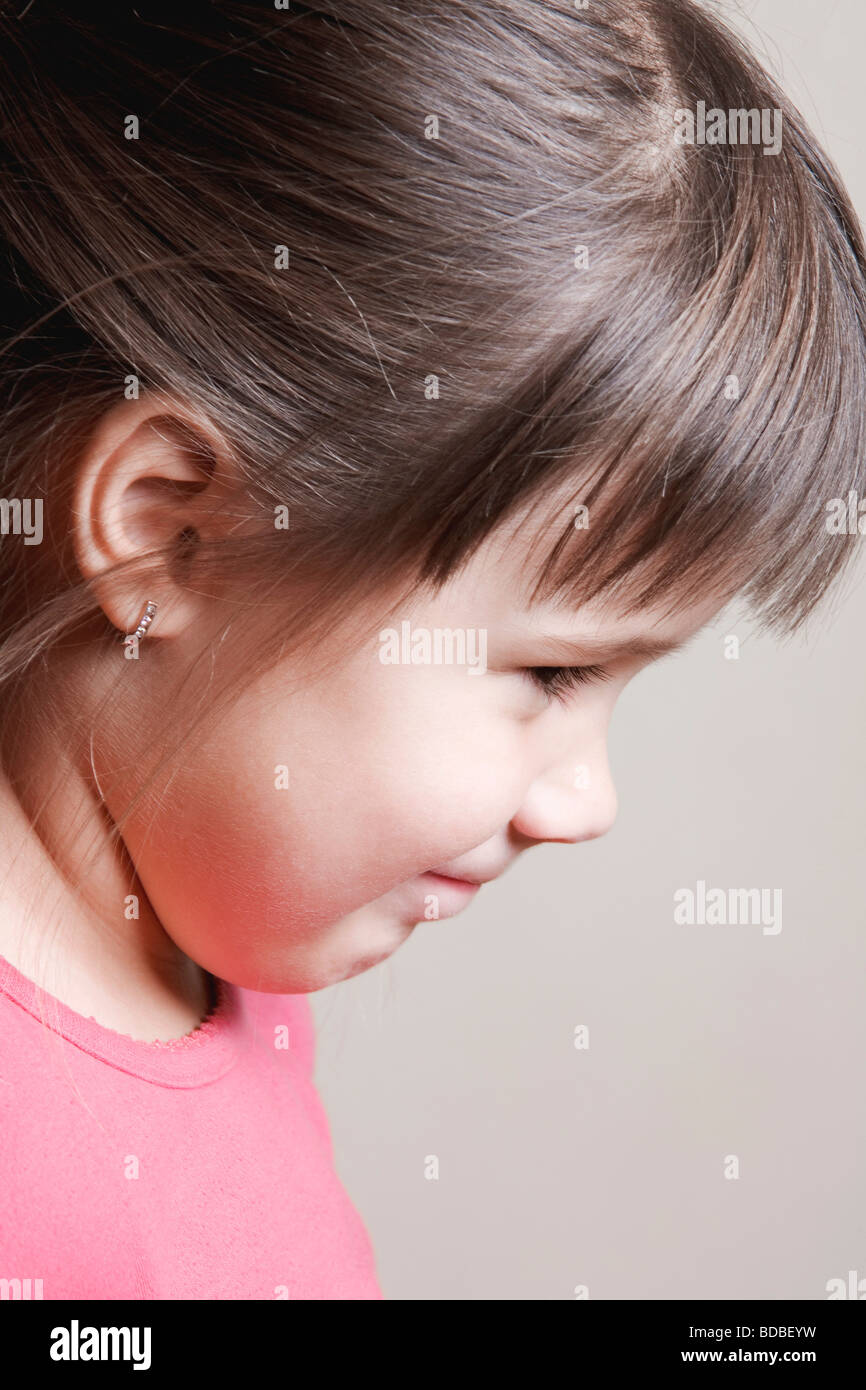 portrait of mischievous young girl Stock Photo - Alamy