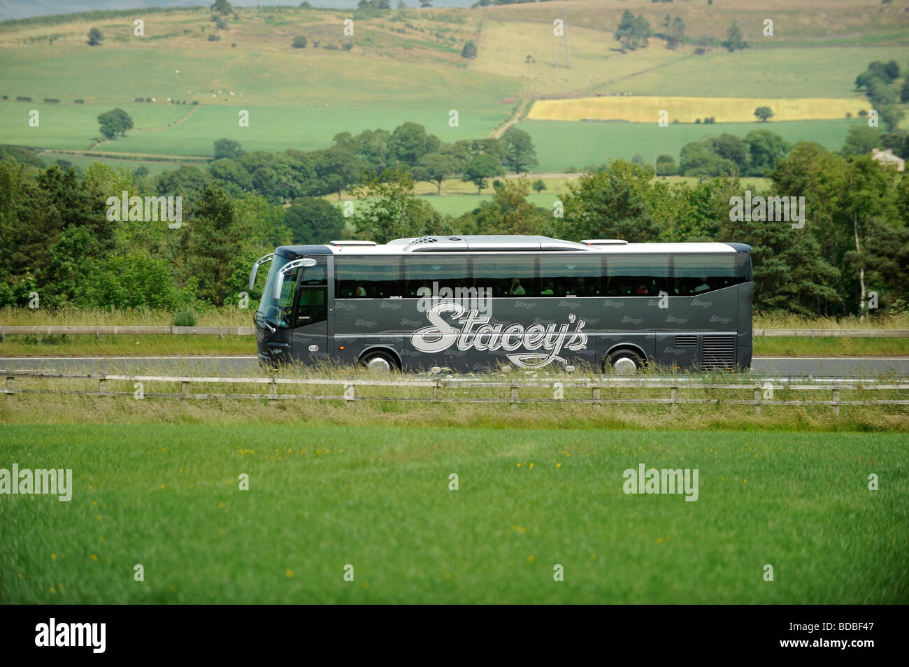 Modern touring coach Stacey s Stock Photo - Alamy