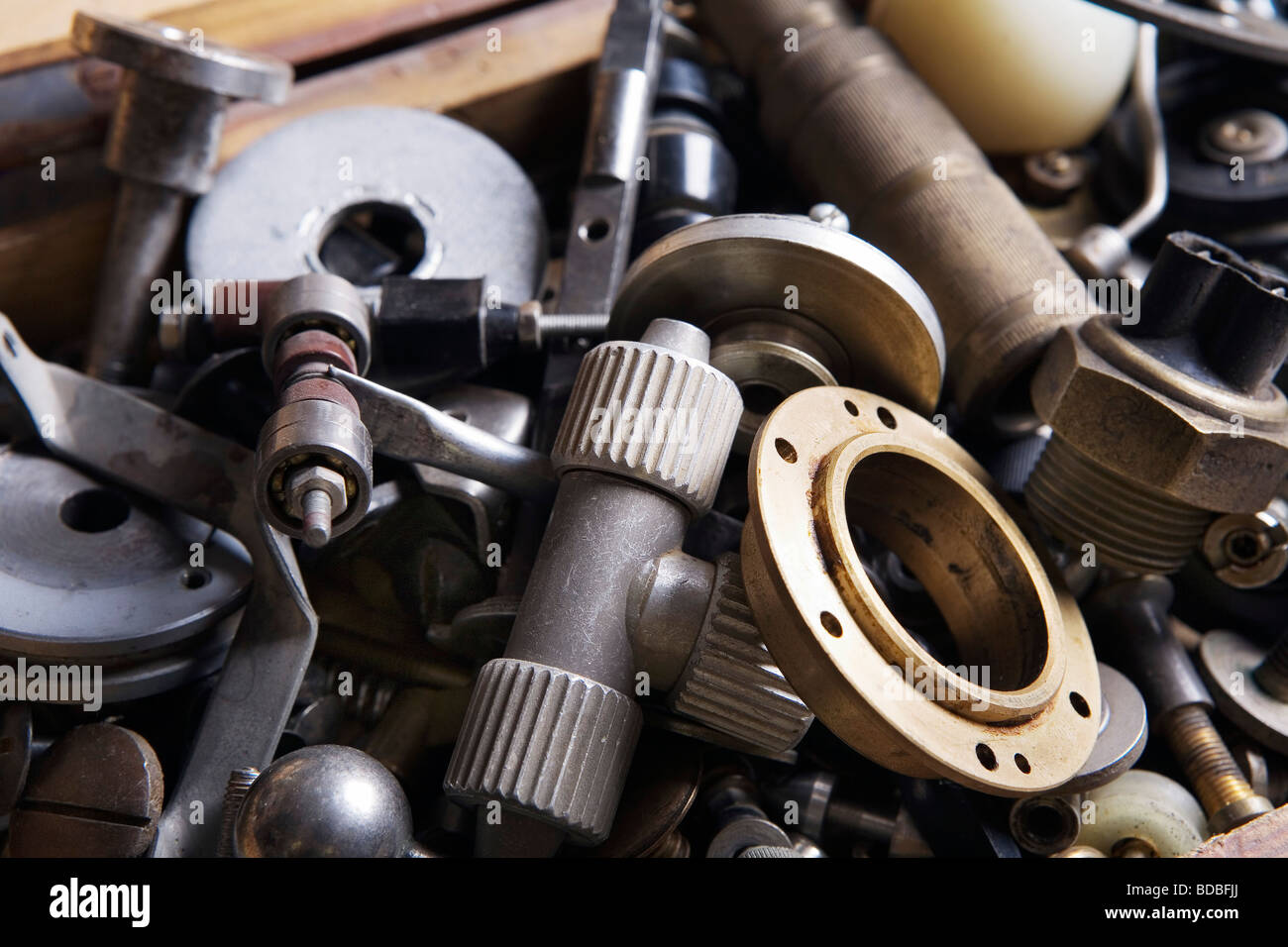 different metal parts in workshop Stock Photo - Alamy