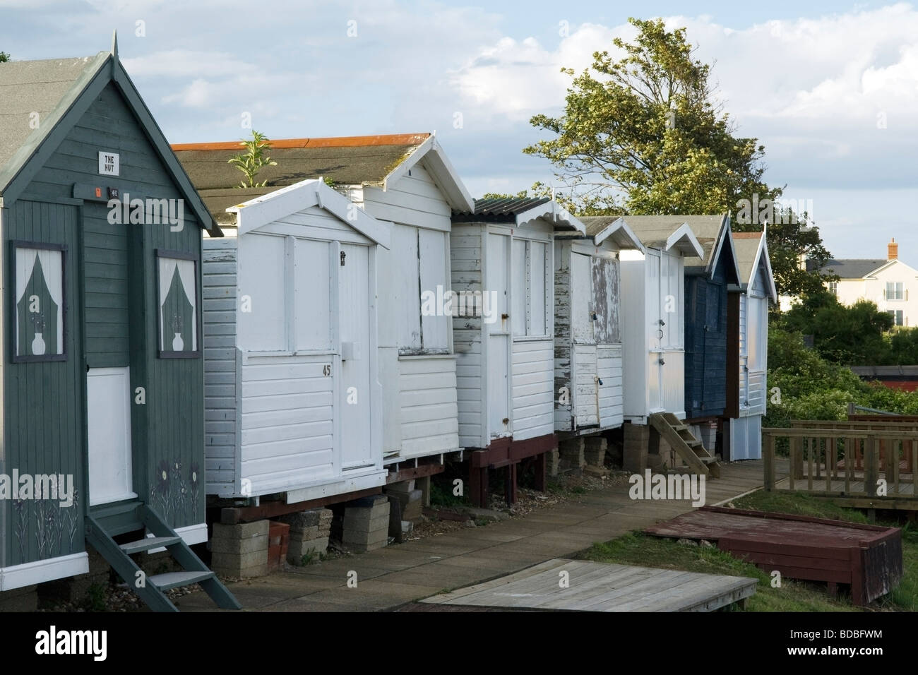 Traditional beach huts at the close of day Stock Photo - Alamy