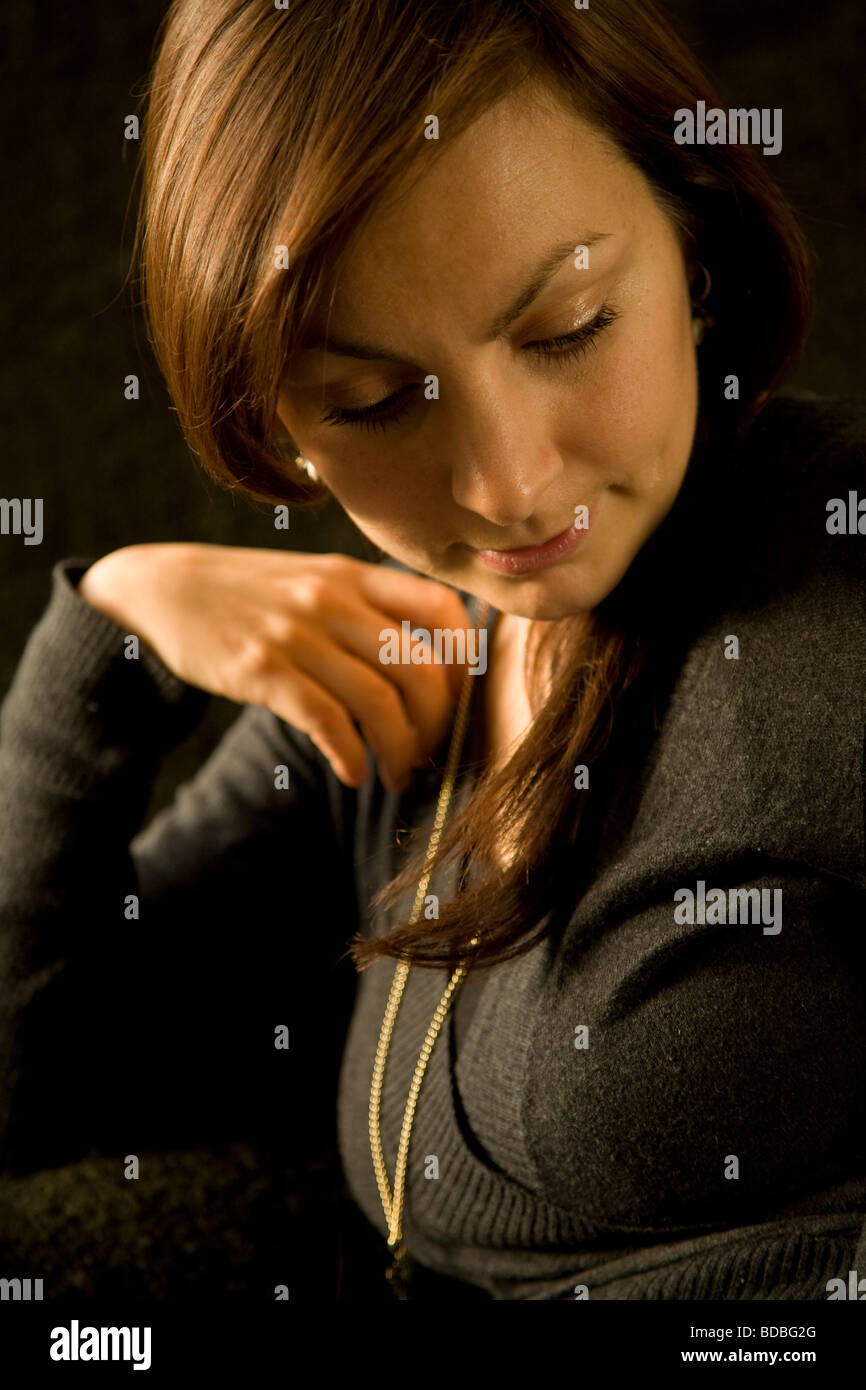 Low Key portrait of an Attractive young Woman Stock Photo - Alamy