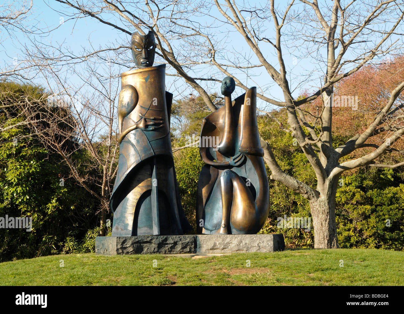 Maori cultural statues with masks denoting ancestorial authority and ...