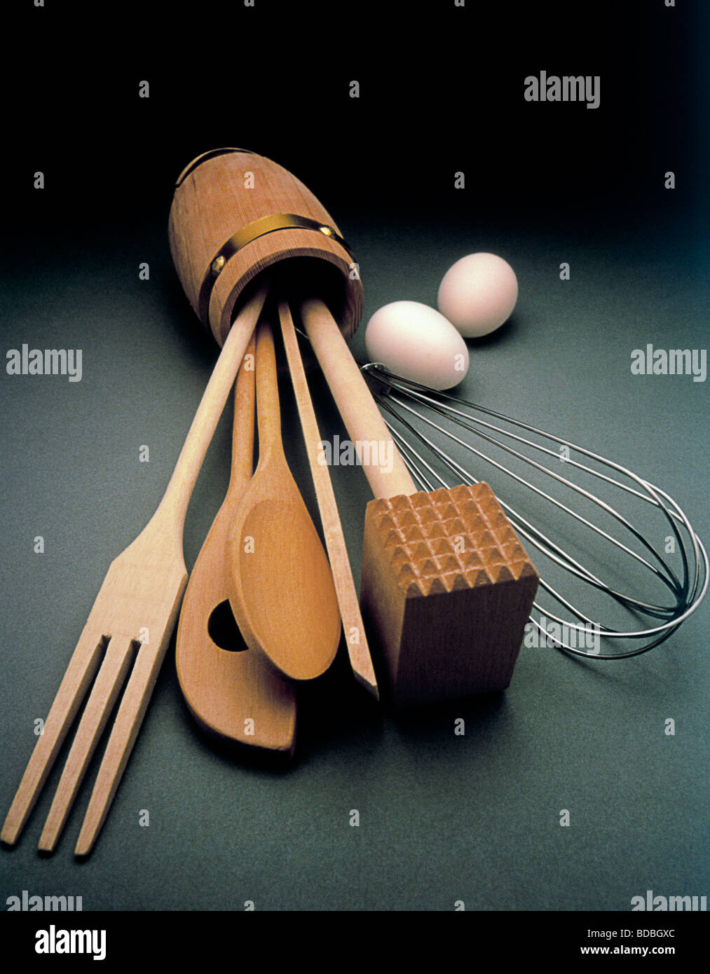 Studio still life close up of wooden kitchen instruments utensils, fork ...