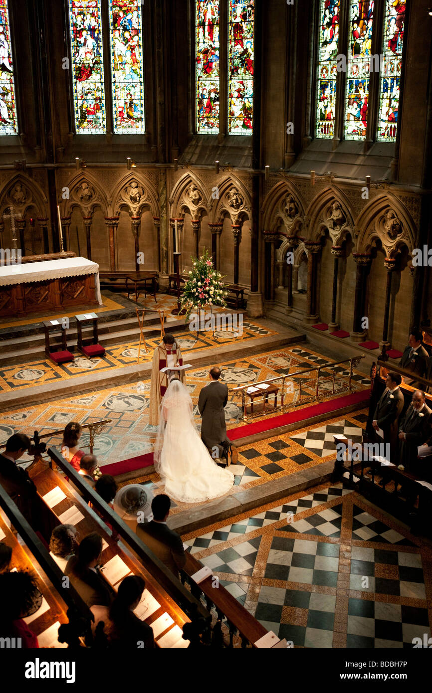 bride and groom at altar Stock Photo - Alamy
