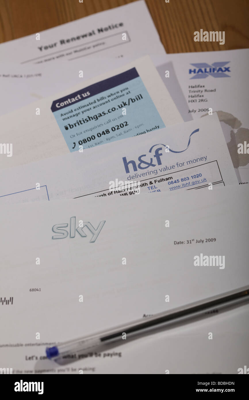 Bills papers gas electricity Stock Photo - Alamy