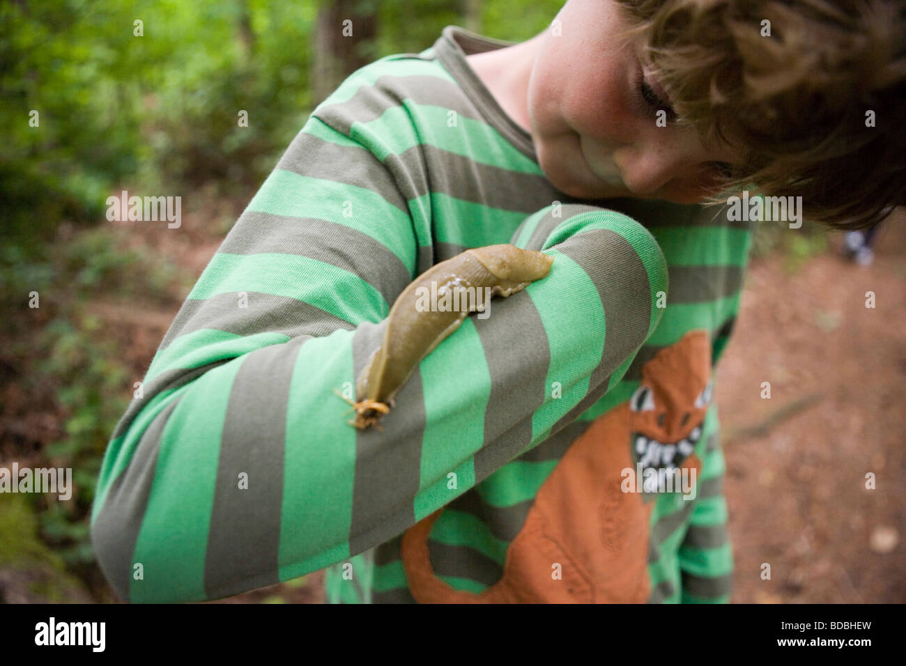 Child eat snail hi-res stock photography and images - Alamy