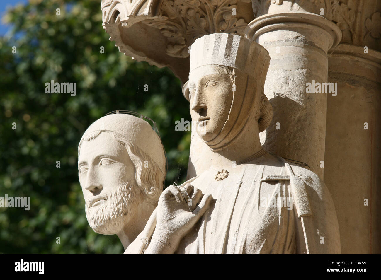 A pair of elegant figures on the outer porch of the central bay Stock ...
