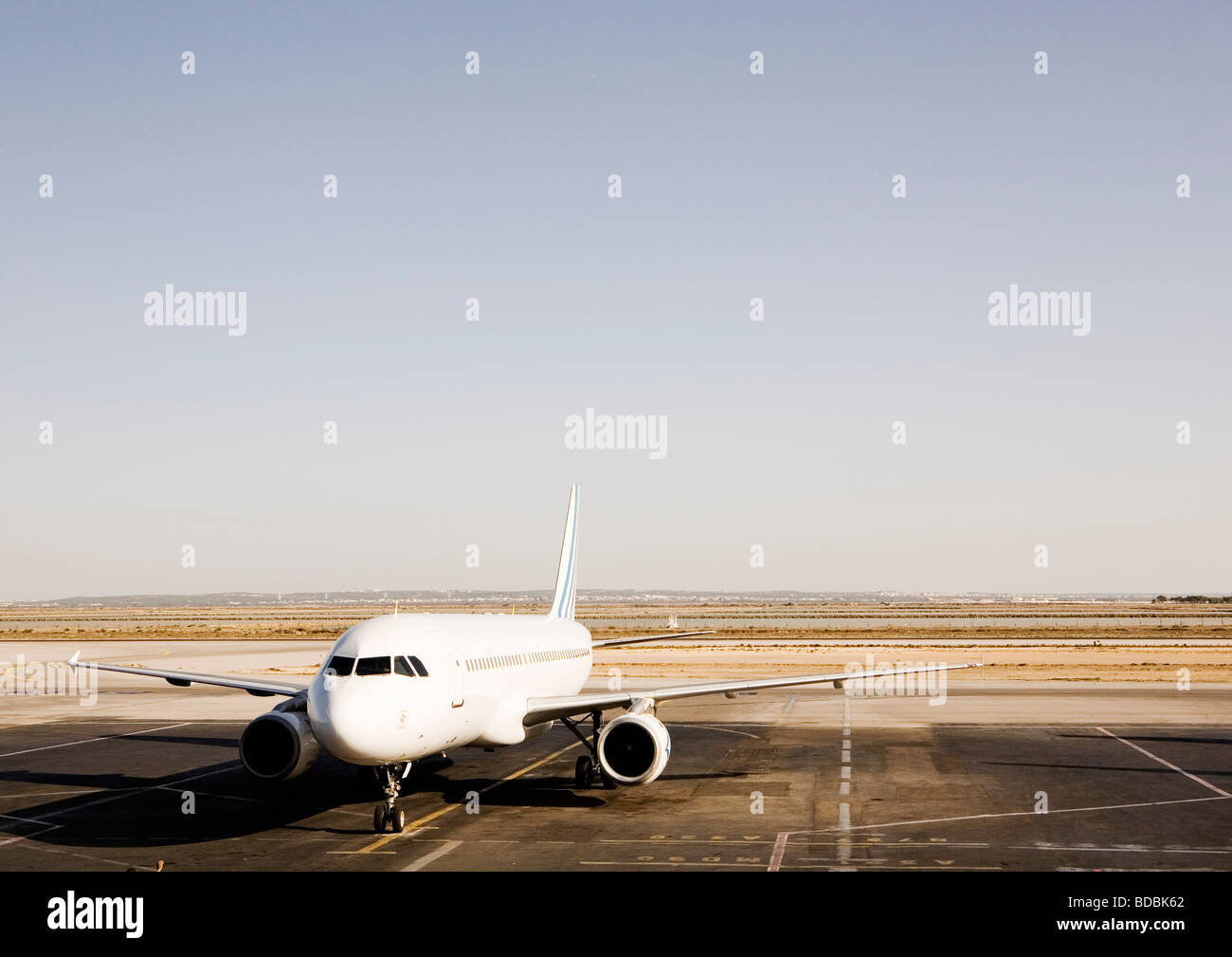 airplane on runway Stock Photo - Alamy