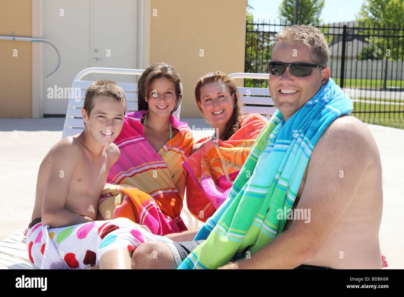 Family at the pool hi-res stock photography and images - Alamy