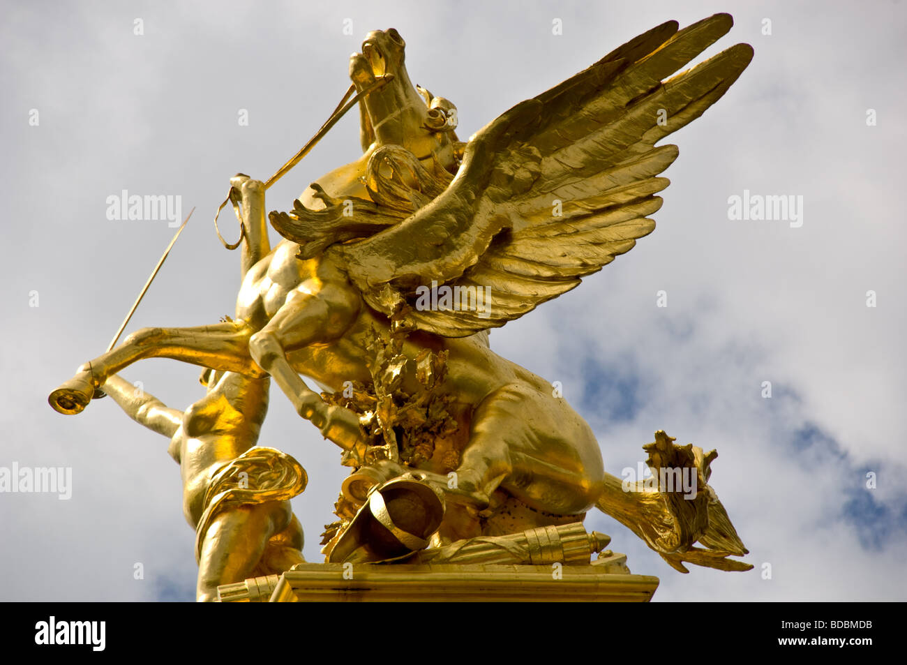 The large gilded statues on 17 meters (56 ft) high granite pillars ...