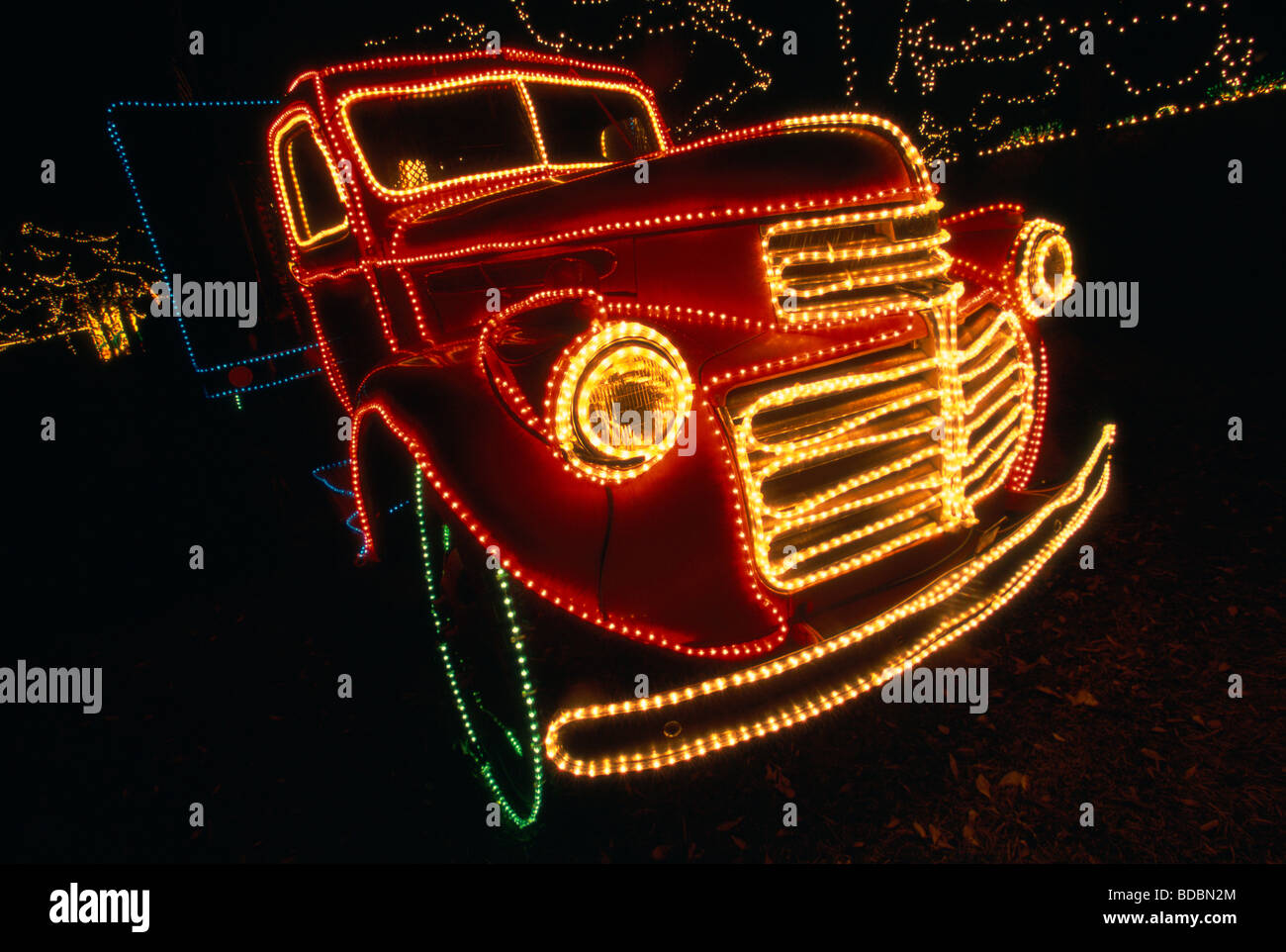 Car lit up with christmas lights at the River of Lights display in ...
