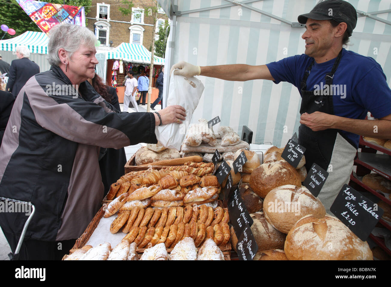 Bread and cake stall at Maida Hill Market Stock Photo - Alamy