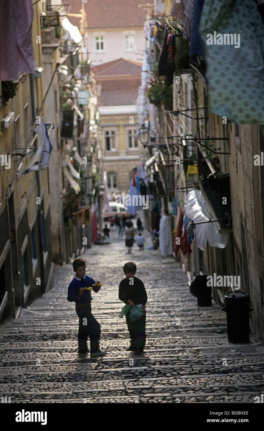 Portugal Lisbon two boys play stairs Barrio Alto Stock Photo - Alamy