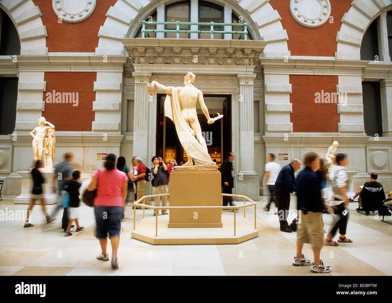 Metropolitan Museum of Art in New York City. Petrie Court. Crowds ...