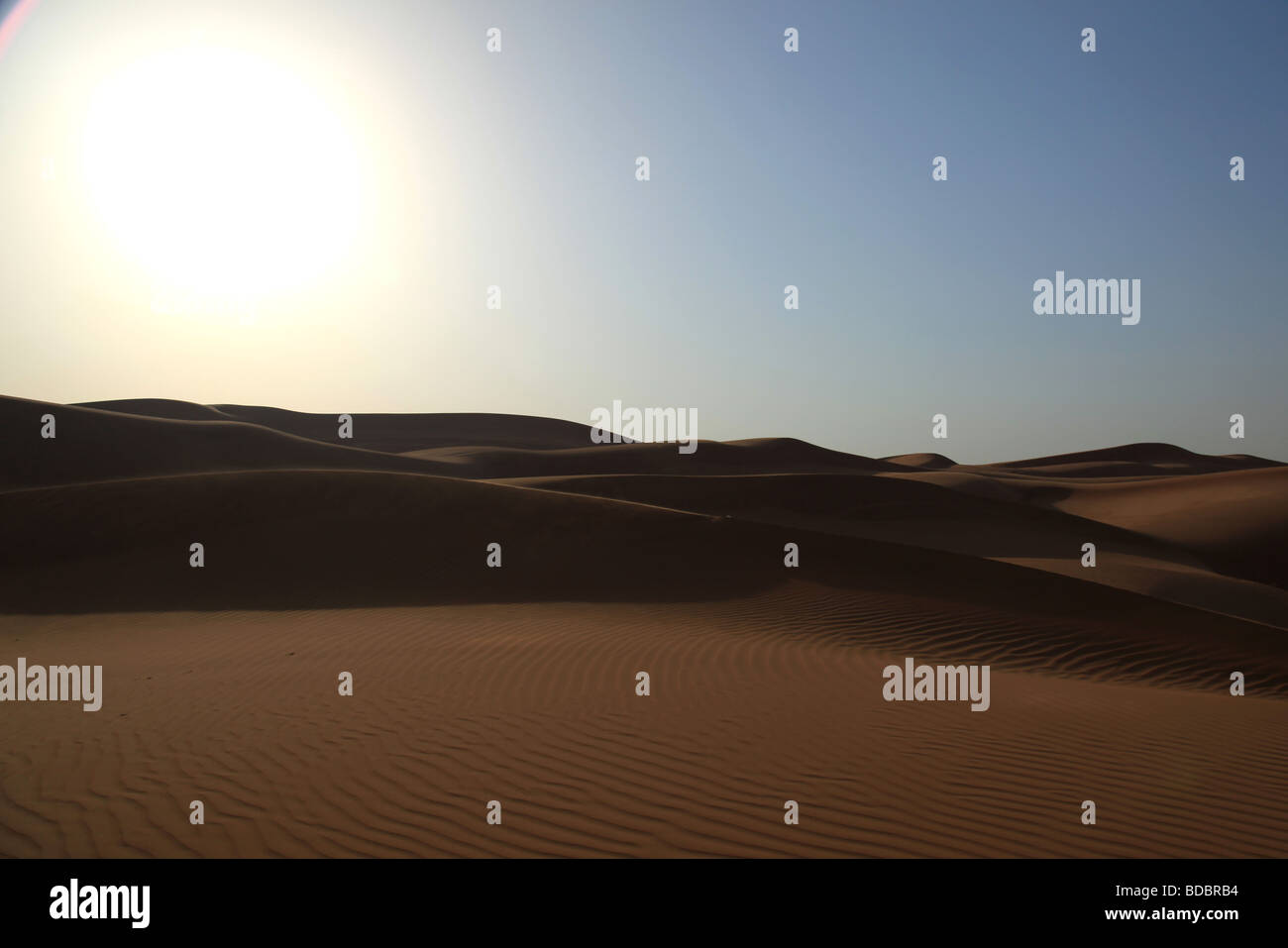 Sunset in the desert sand dunes in Dubai United Arab Emirates Stock ...
