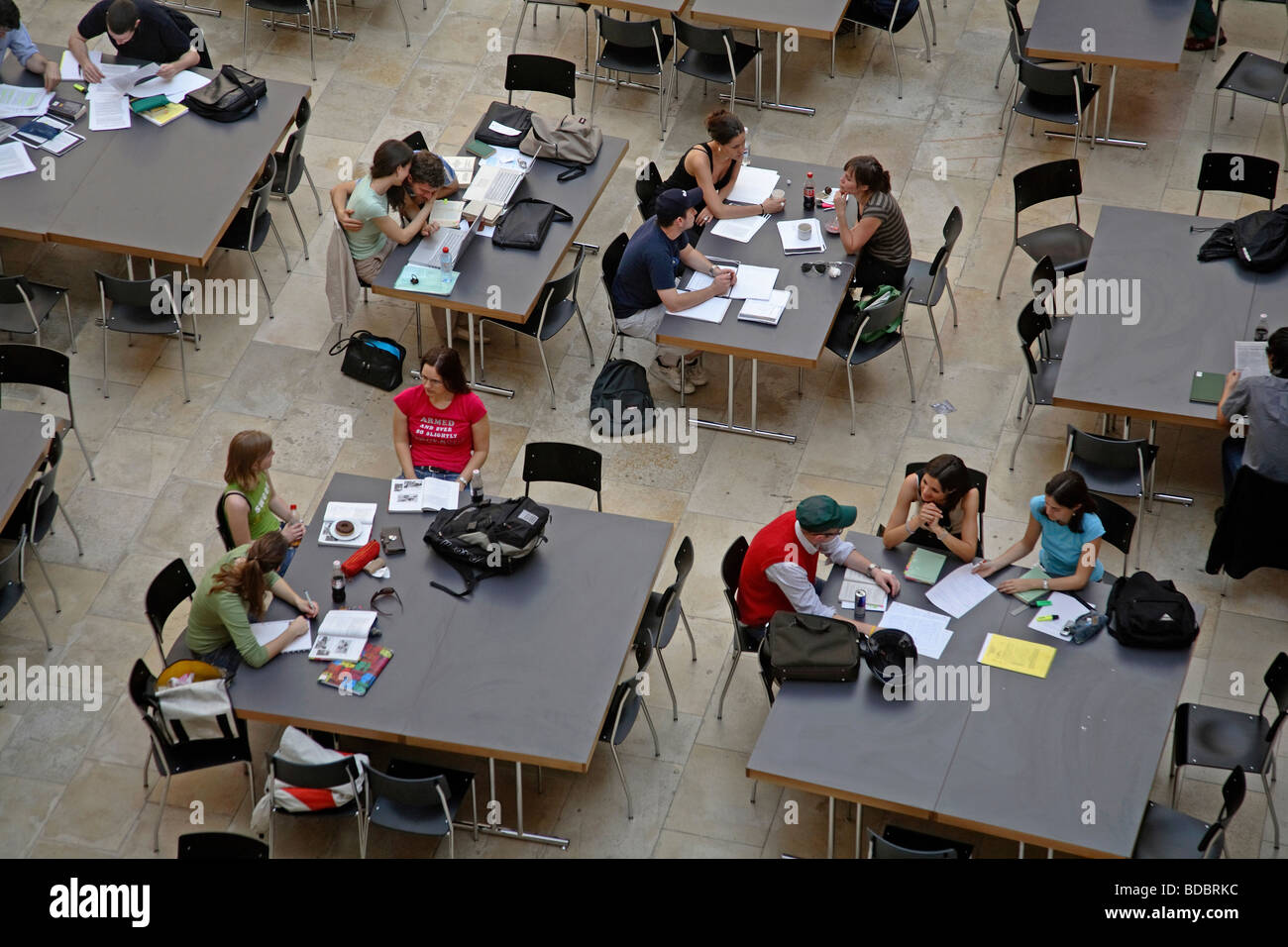 Students learning and chatting at the university Stock Photo - Alamy