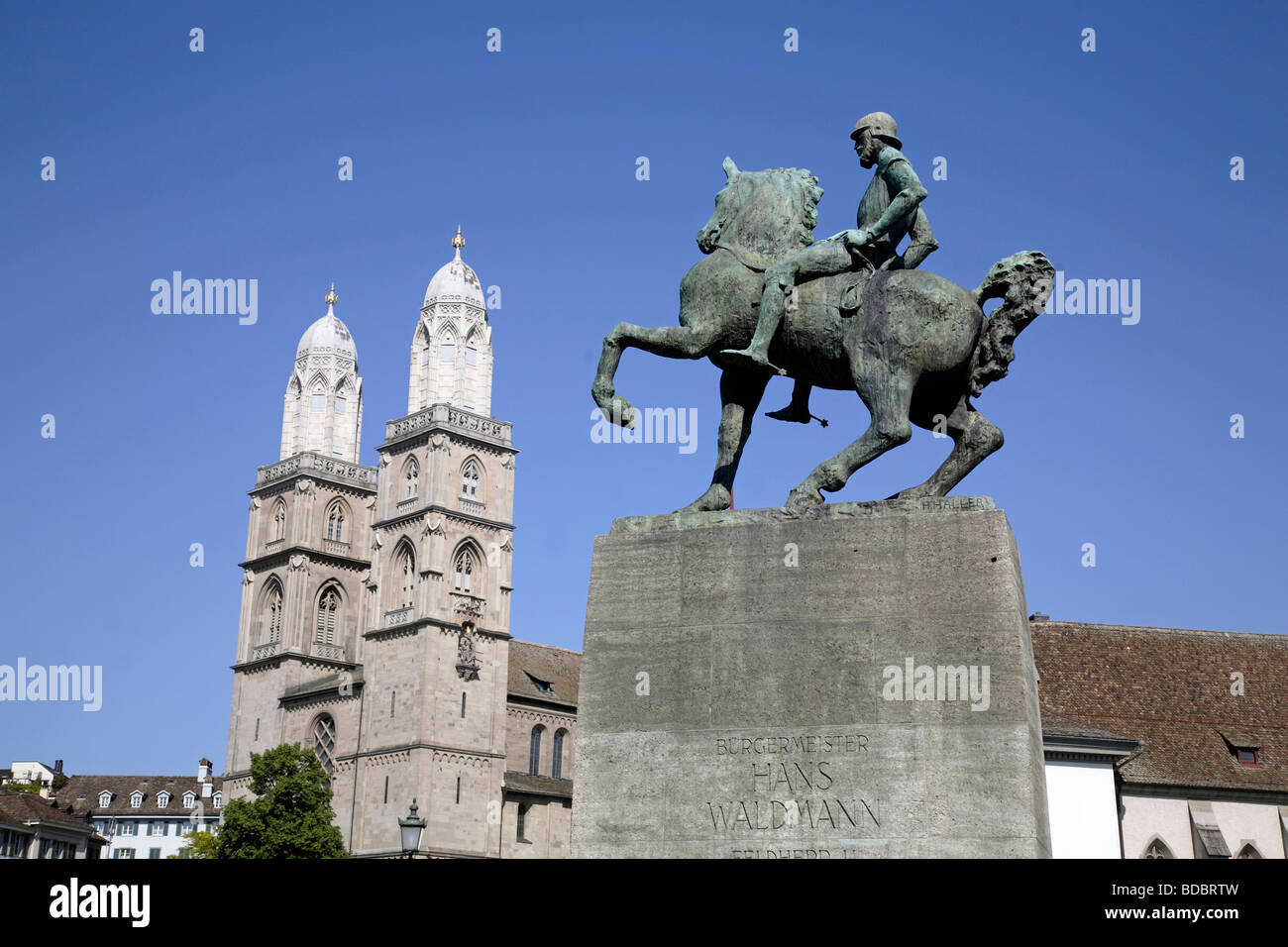 Grossmuenster cathedral and the statue of Hans Waldmann, Zurich ...