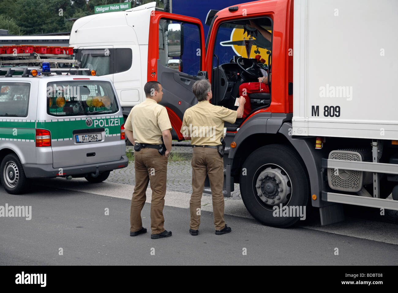 Police officers pull hi-res stock photography and images - Alamy