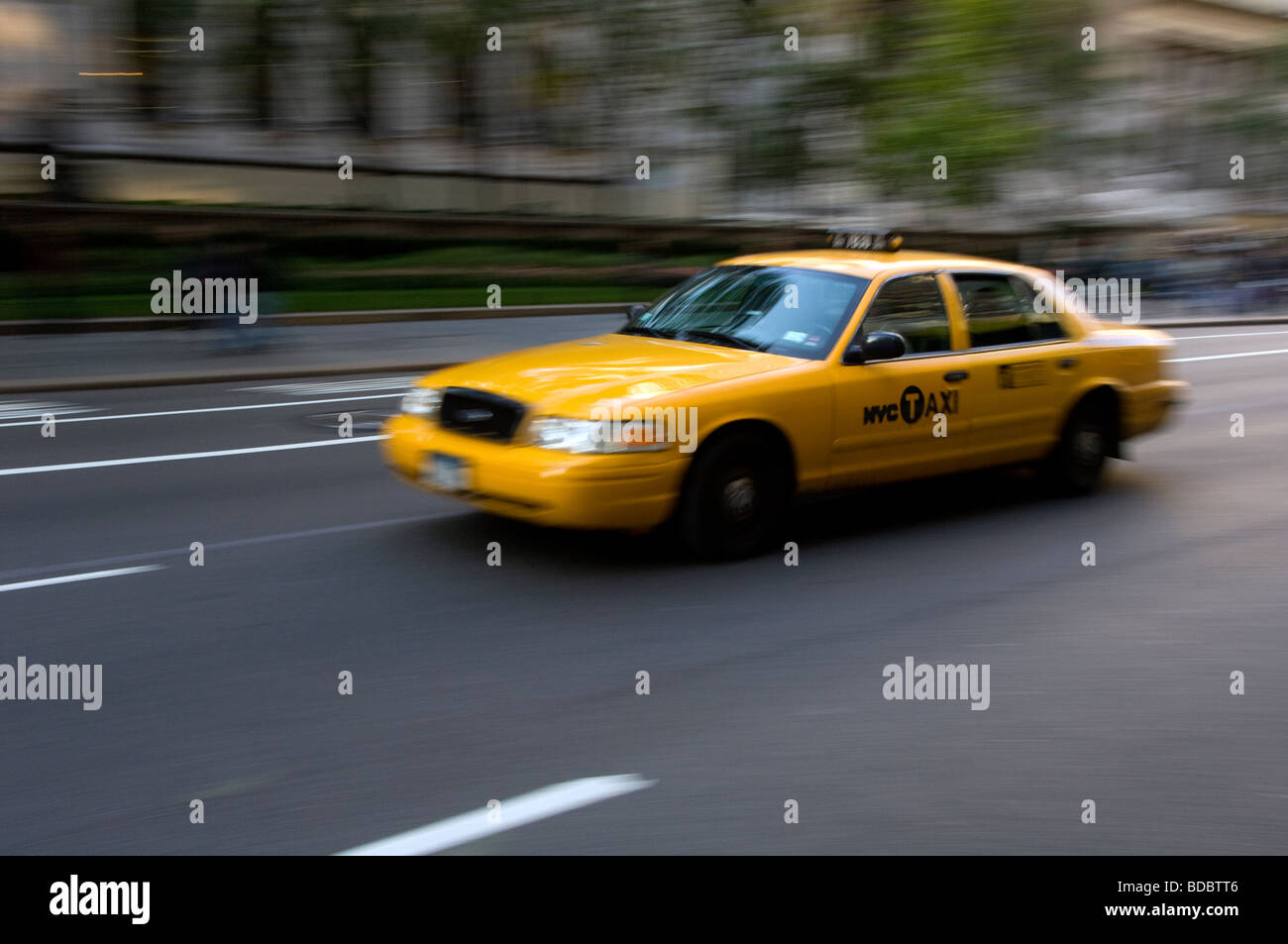 Taxi Cab in Motion Stock Photo - Alamy