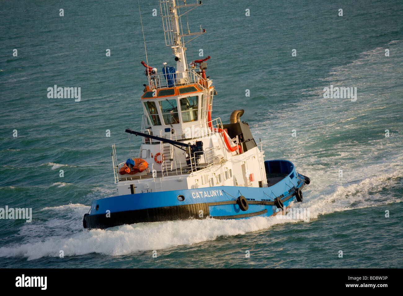 Tug boat on the Mediterranean sea in Barcelona Spain Stock Photo - Alamy