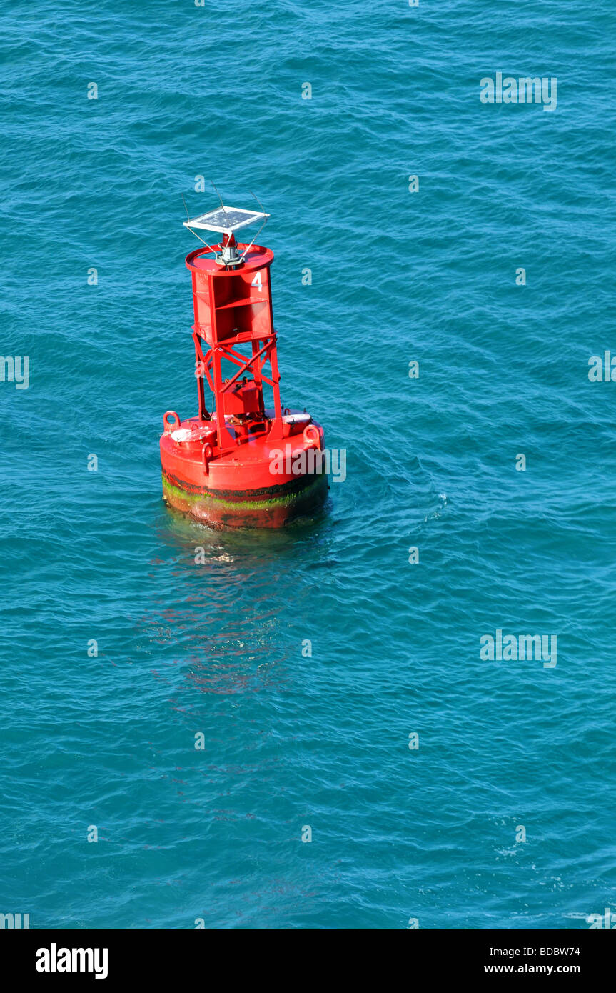 Navigational buoy floating in the ocean Stock Photo - Alamy
