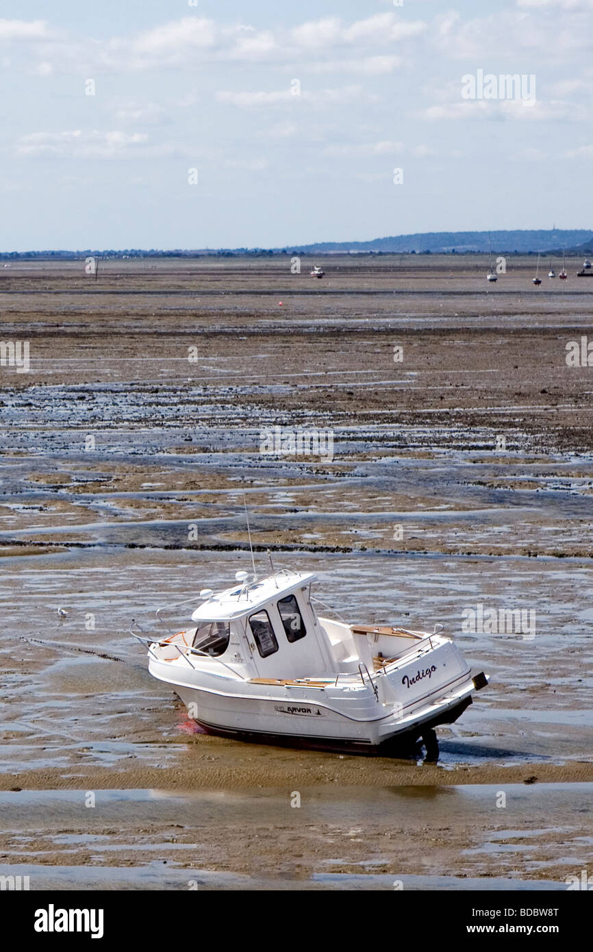 Boat stranded on the beach Stock Photo - Alamy