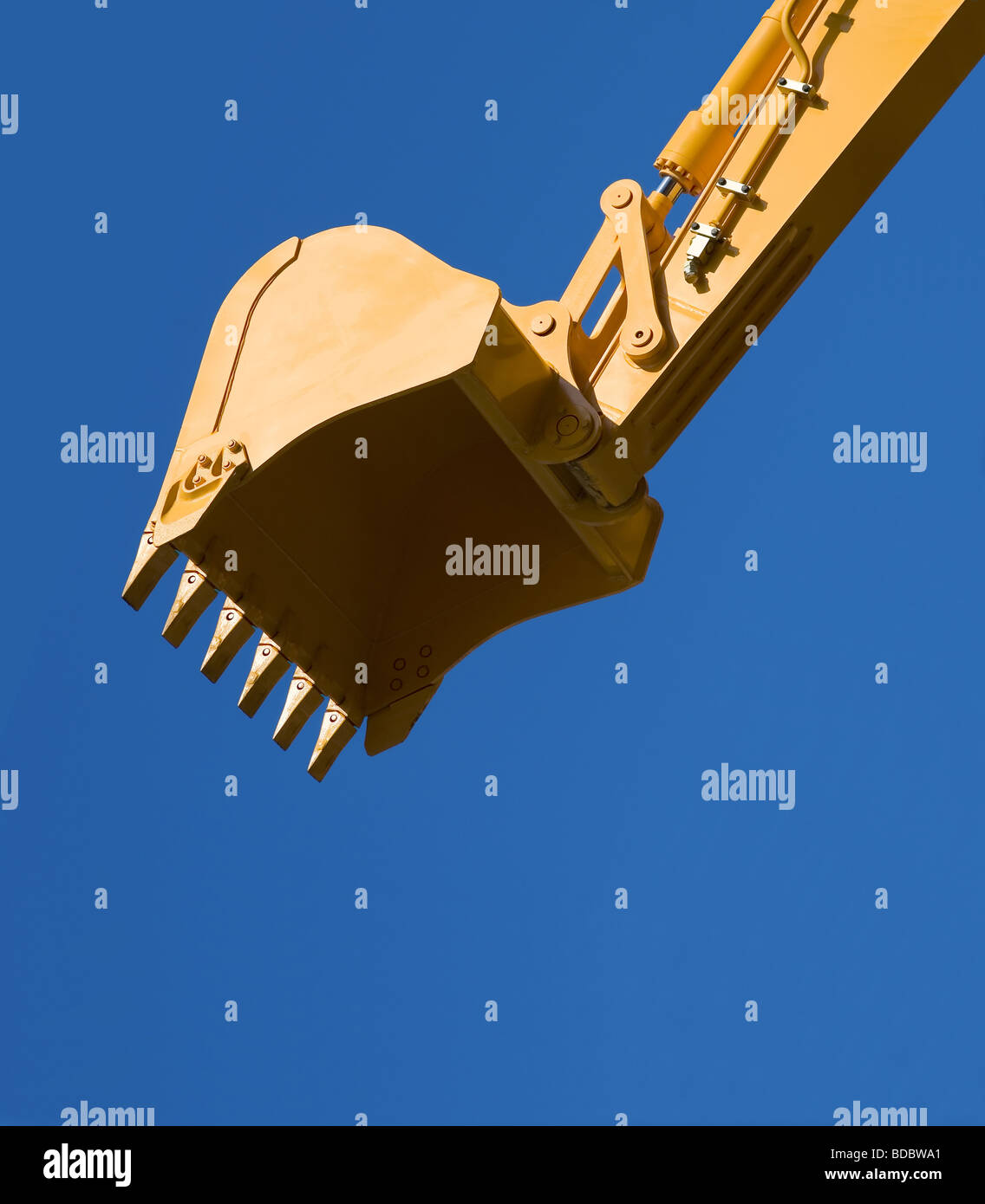 Bulldozer shovel opposite blue sky Stock Photo - Alamy