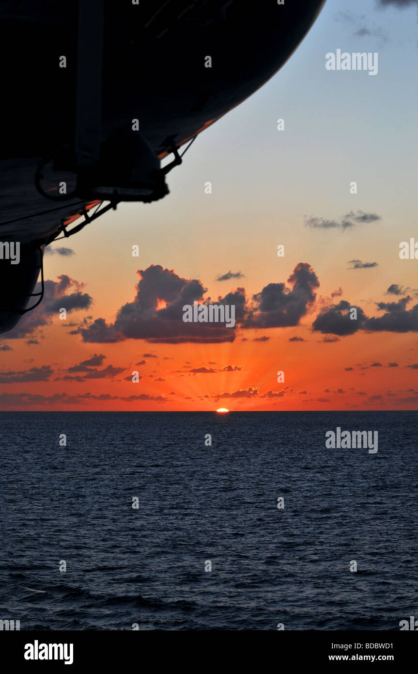 Sunset at sea view from a cruise ship Stock Photo - Alamy