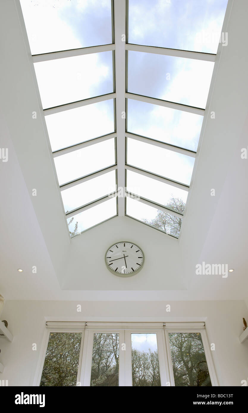Looking up at glass apex ceiling of modern kitchen extension Stock ...