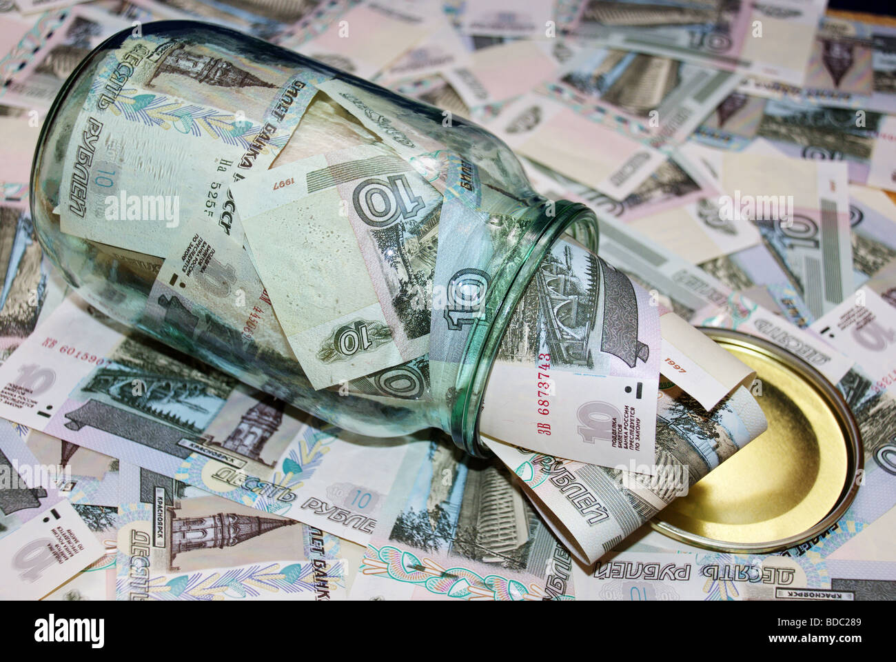 Money jars hi-res stock photography and images - Alamy